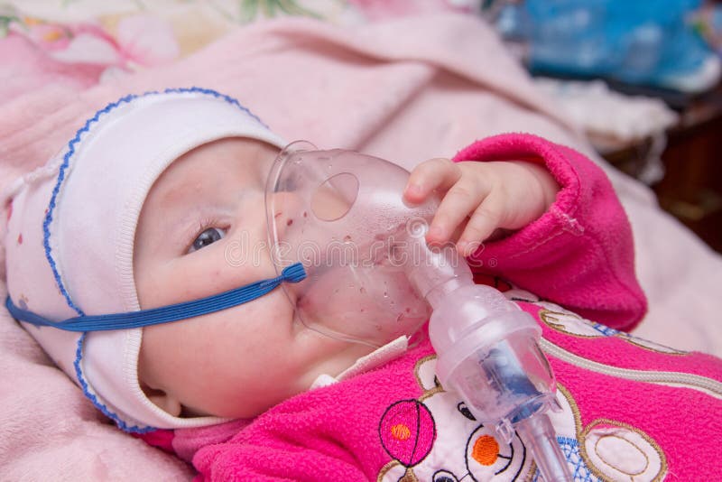 Baby with Inhaler,the Baby is Treated at Home with a Nebulizer Stock ...