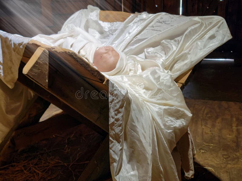Baby Jesus in a Barn Manger with Light Beams Stock Photo - Image of ...
