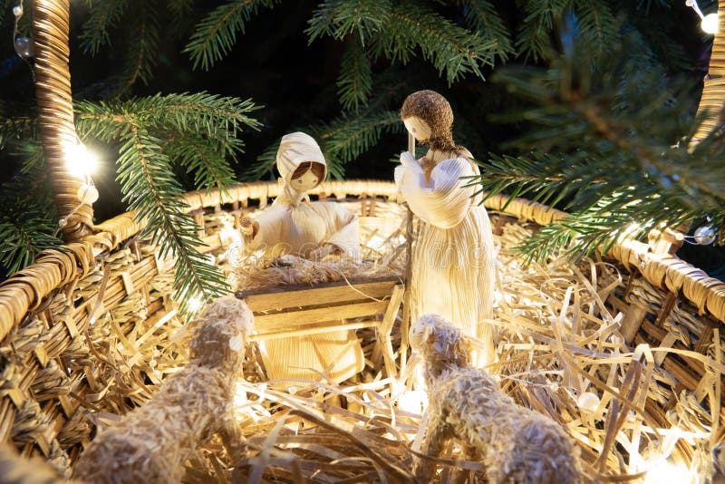 Baby Jesus Resting on a Manger with Light from the Star Filters through ...