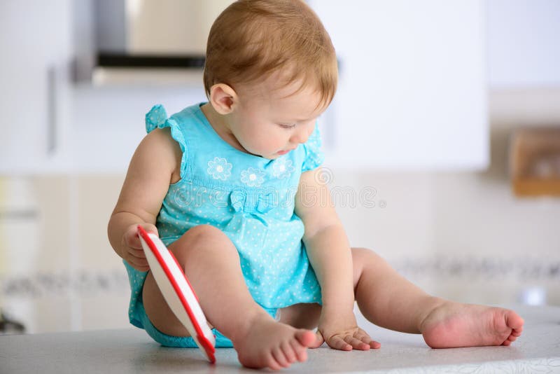 Baby in kitchen stock image. Image of girl, infant, emotion - 33667507