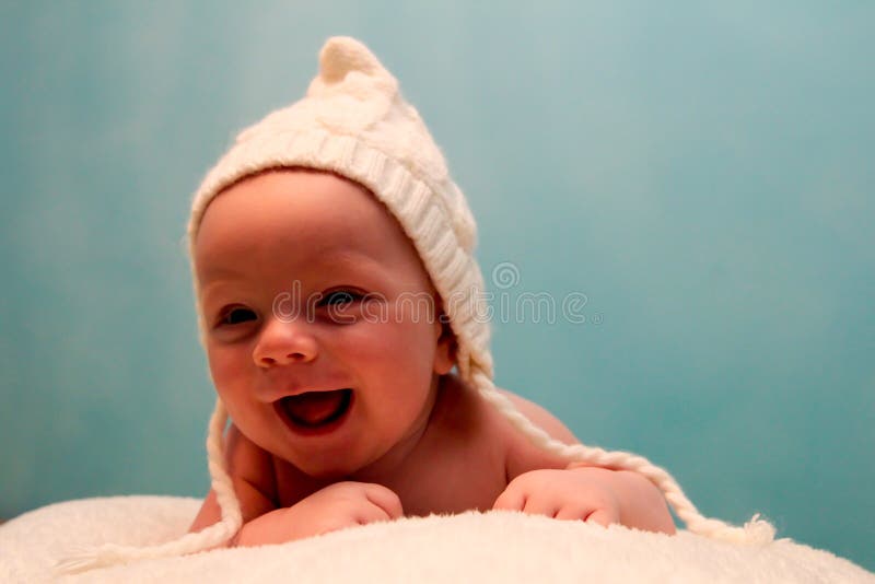 Baby in a Knitted Hat Looks into the Camera Lens Stock Image - Image of ...
