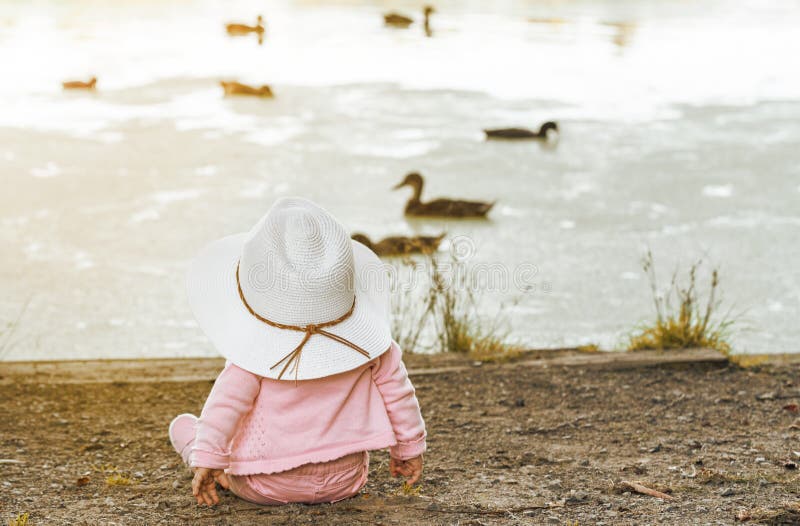 Baby at lake stock photo. Image of explore, children, child - 1100340