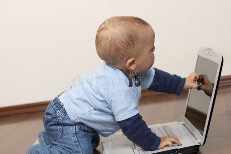 Baby with laptop stock image. Image of competition, caucasian - 15003253