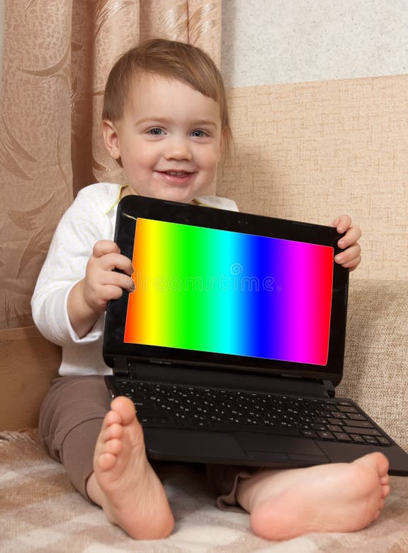 Baby with laptop stock image. Image of girl, indoors - 27445391