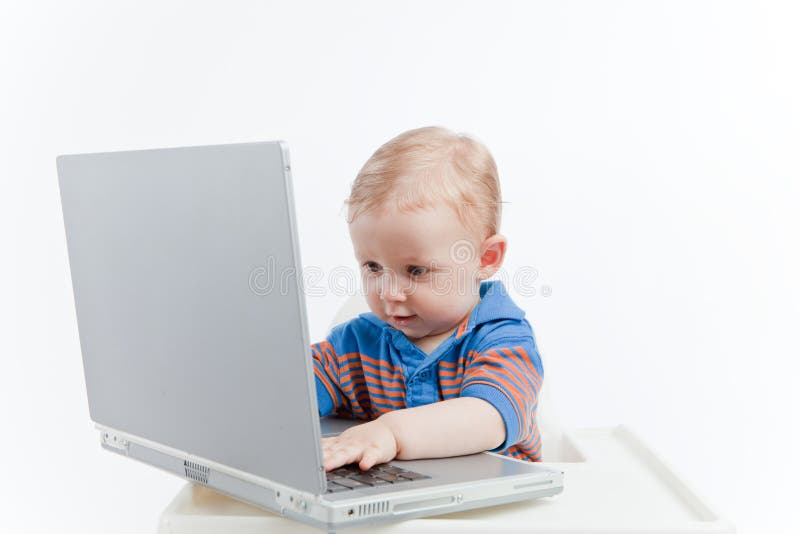Baby boy with laptop stock photo. Image of technology - 25854184