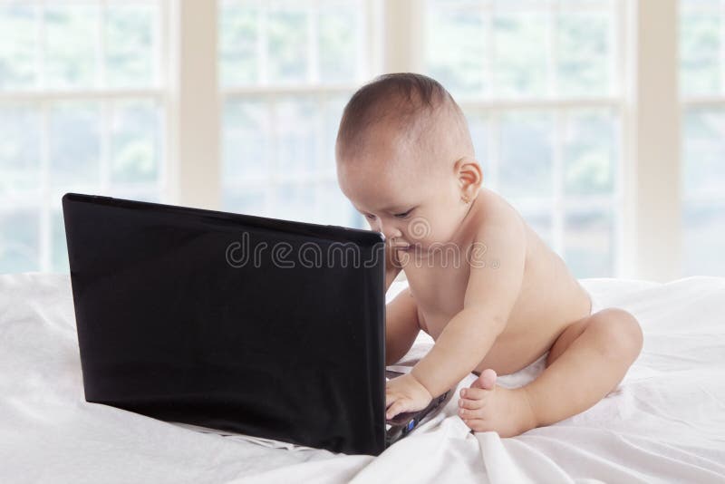 Baby with Laptop on Bedroom Stock Image - Image of little, computer ...
