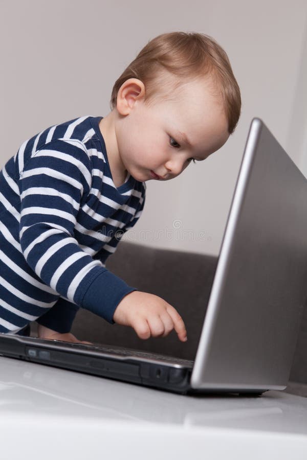 Baby with laptop stock photo. Image of single, person - 39342212
