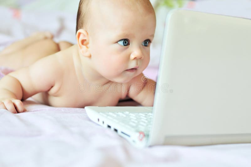 Baby with laptop at home stock photo. Image of happy - 42089534