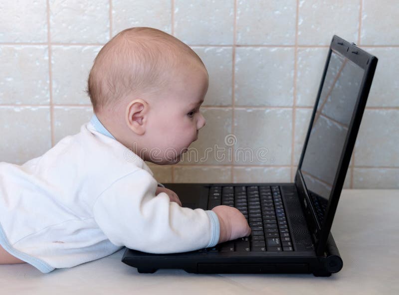 Baby with laptop stock photo. Image of european, small - 85759616