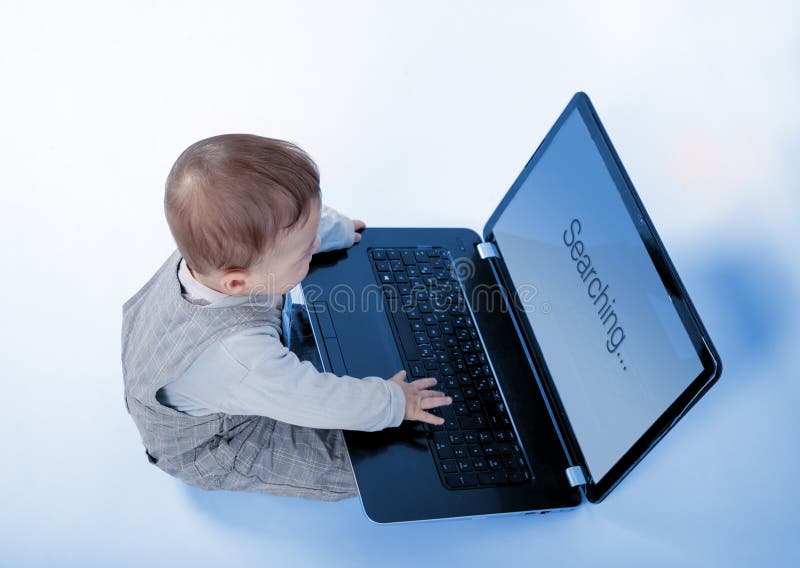 Baby and the laptop stock photo. Image of people, internet - 88456226
