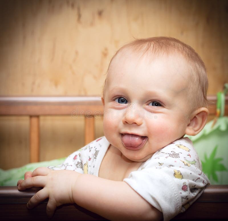 Baby laughs stock photo. Image of blond, cheerful, human - 25694724