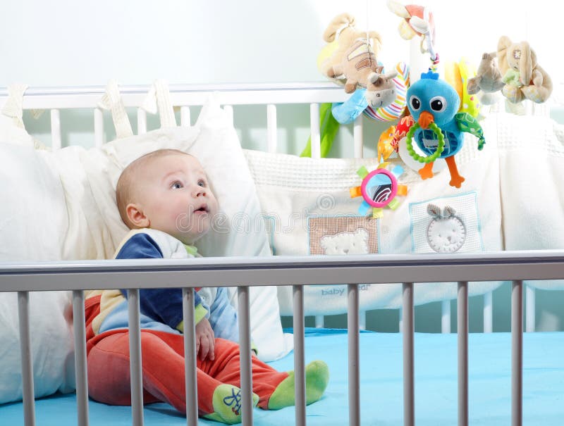 Baby Learning through Senses in Cot Stock Image - Image of innocent ...