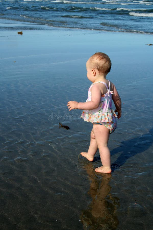 Baby learning to walk stock image. Image of love, family - 1163061