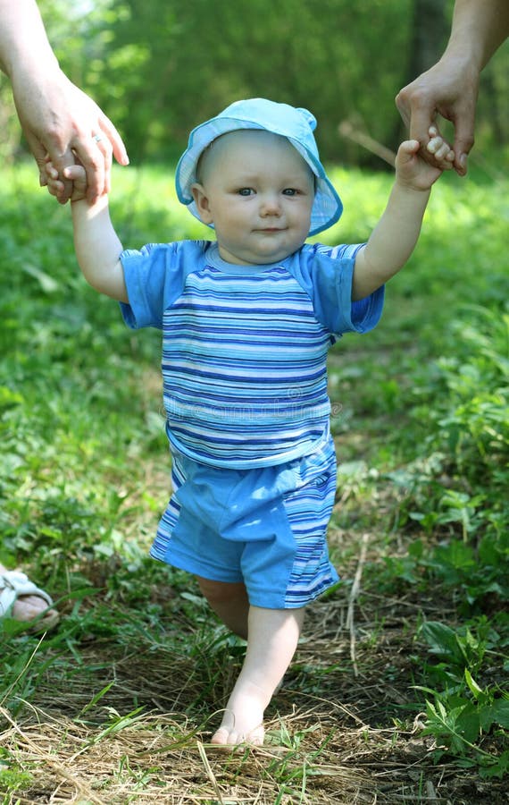 Baby learning to walk stock photo. Image of blue, boys - 14689314