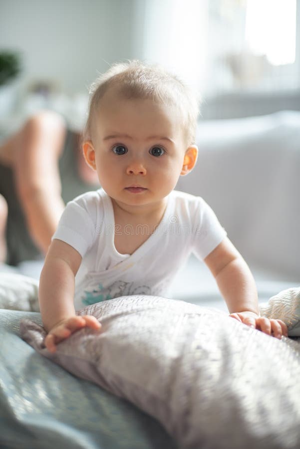 Baby Lifting Herself from Belly Up Stock Image - Image of portrait ...