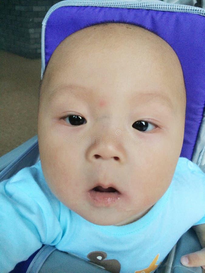 Baby look at camera stock photo. Image of look, camera - 42980142