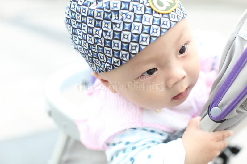 Baby looking back stock photo. Image of expression, sitting - 46153986