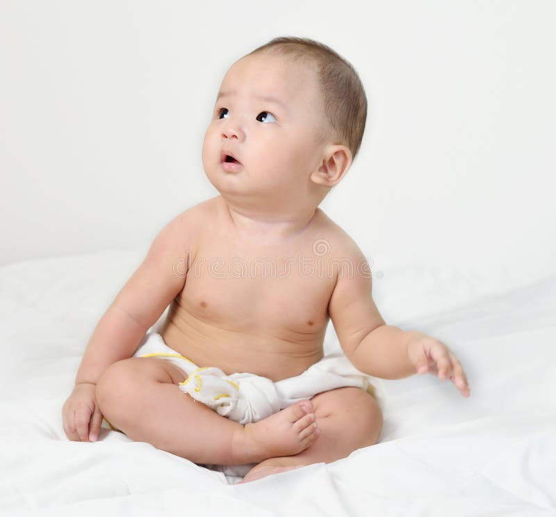 Baby Looking To Find Some Things. Stock Photo - Image of face, child ...