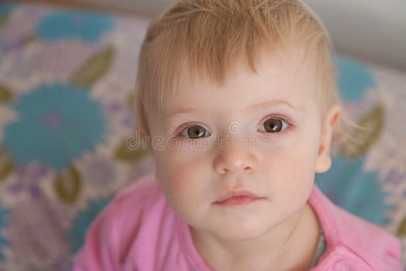 Baby looking upwards stock image. Image of small, pink - 26517341