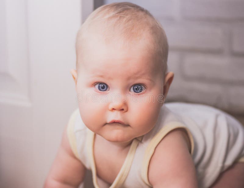 Baby with Expressive Face stock image. Image of girl - 16883339