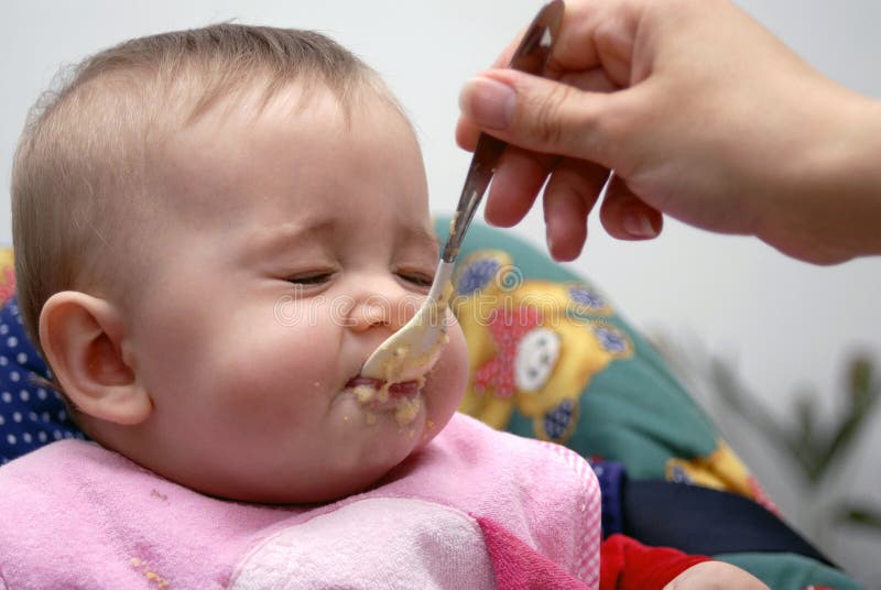 Baby at lunch time stock image. Image of comforting, high - 6954043