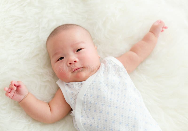 Chinese baby face smirking stock photo. Image of looking - 19376676
