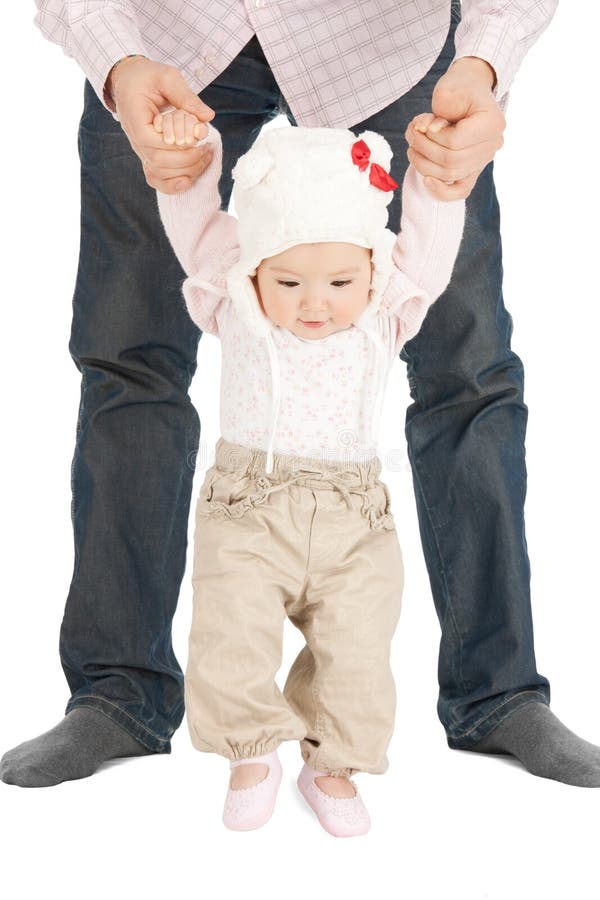 Baby Making First Steps with Father Help Stock Photo - Image of hands ...