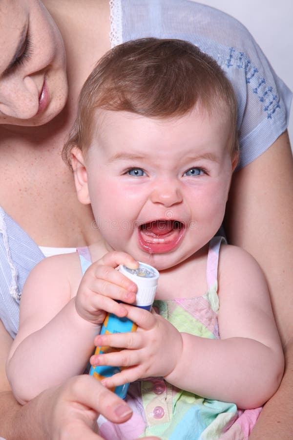Baby making a funny face. stock photo. Image of blue - 29066190