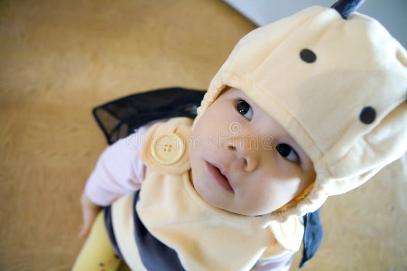 Baby in masquerade bee stock photo. Image of girls, crib - 10562188