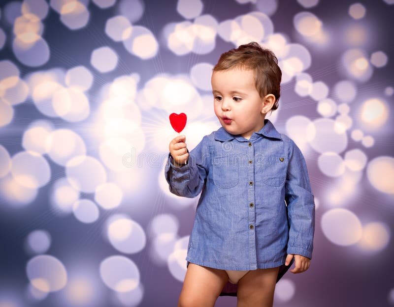 Baby met lolly stock foto. Image of kind, kinderjaren - 39333816