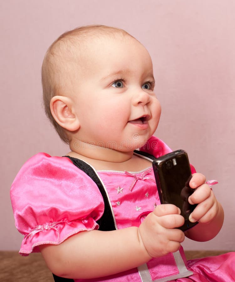 Baby with mobile stock image. Image of inspiration, face - 12471553