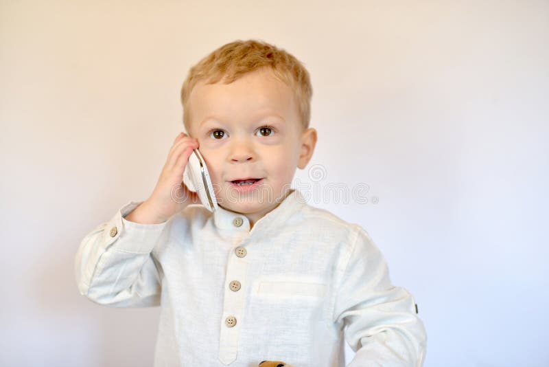 Baby with a mobile phone stock photo. Image of small - 38026092