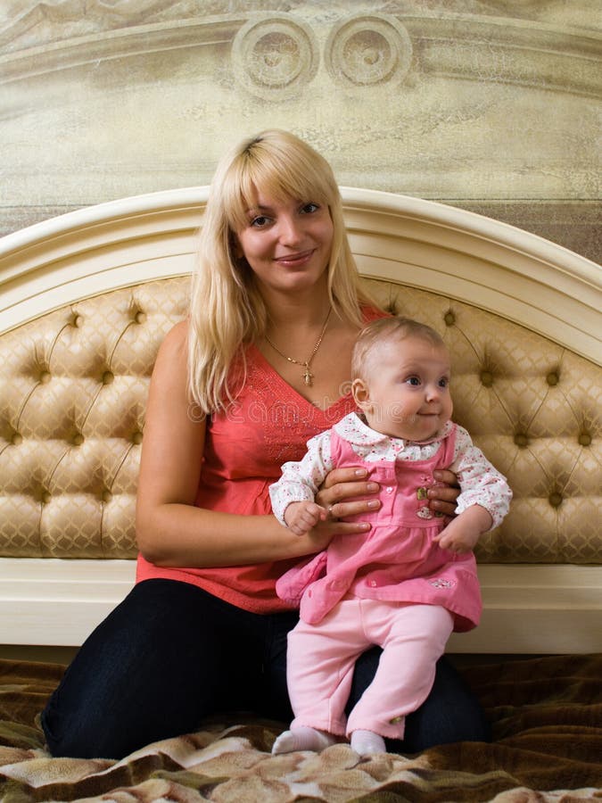 Baby with mom stock image. Image of lady, daughter, beige - 7545417