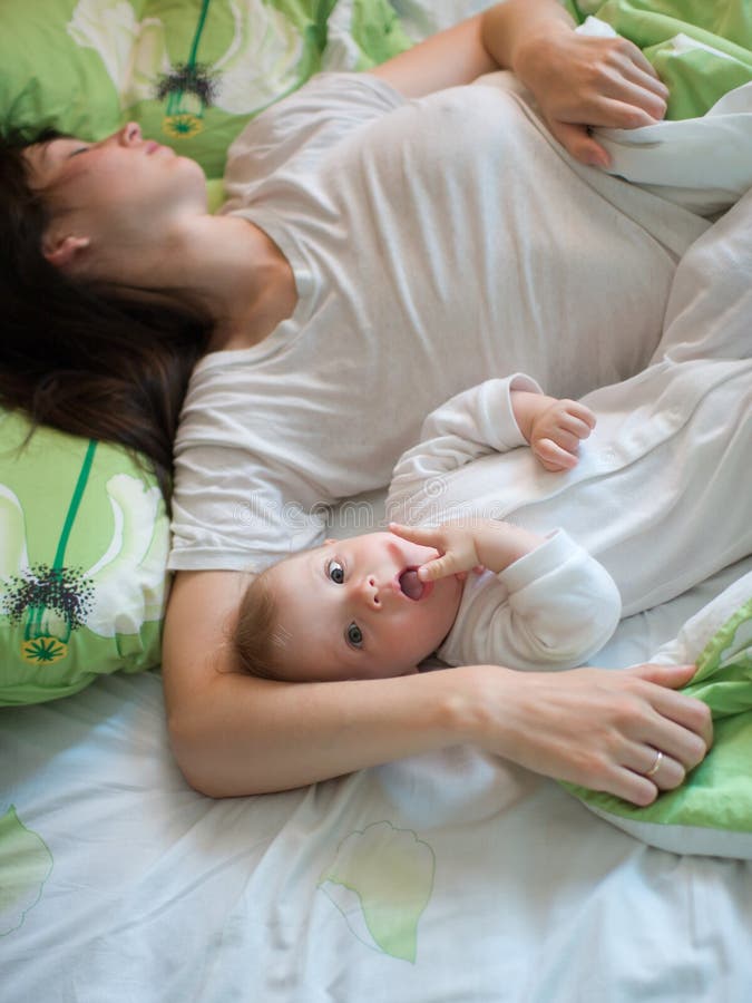 Baby with mom stock photo. Image of green, girl, little - 9092864