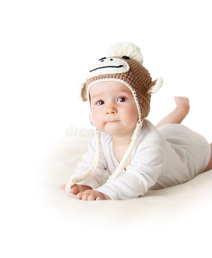 Baby in monkey hat stock image. Image of birth, face - 56562107
