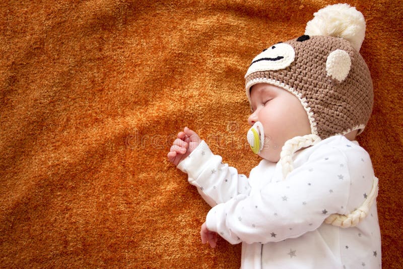 Baby in monkey hat stock image. Image of innocence, healthy - 56605773