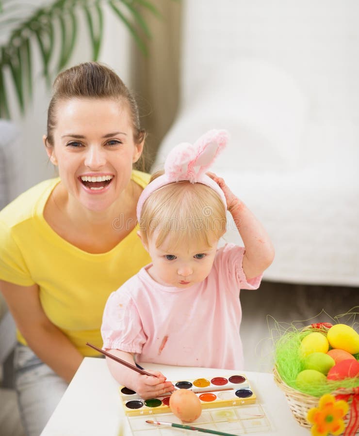 Family are painting eggs stock photo. Image of easter - 110723158