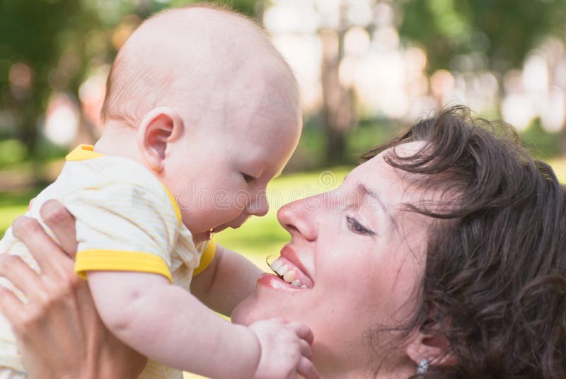Baby and Mother Look at Each Other Stock Photo - Image of portrait ...