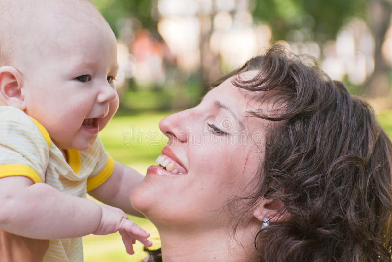 Baby and Mother Look at Each Other Stock Photo - Image of portrait ...