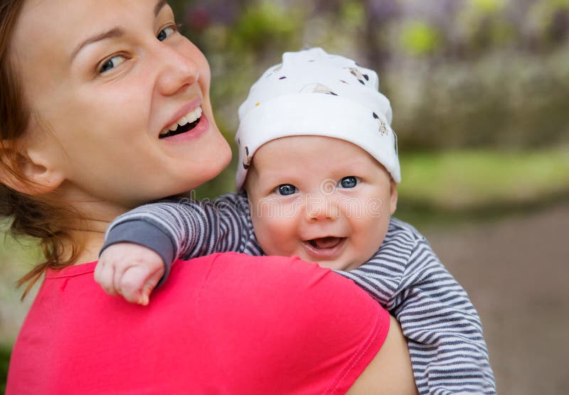 Baby and mother on nature stock image. Image of childhood - 66621541