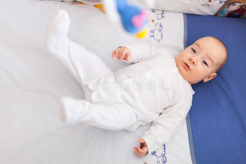 Baby moving legs stock image. Image of moving, playful - 39729447