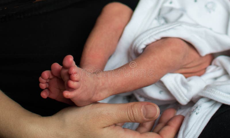 Baby Newborn. Foot of a Baby Boy Stock Photo - Image of little, hand ...
