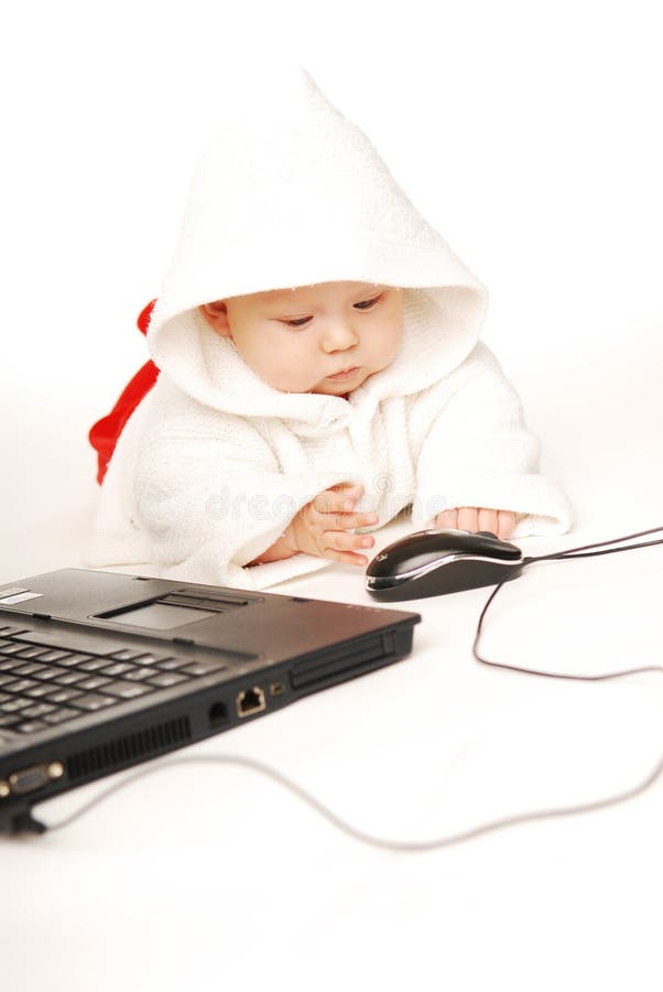 Baby and notebook stock photo. Image of suckling, girl - 4478538
