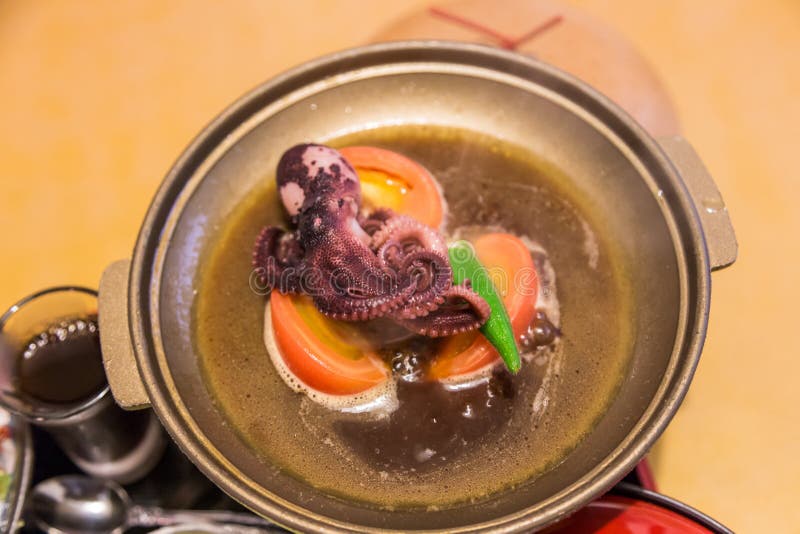 Baby octopus soup. stock image. Image of tentacle, light - 85357317