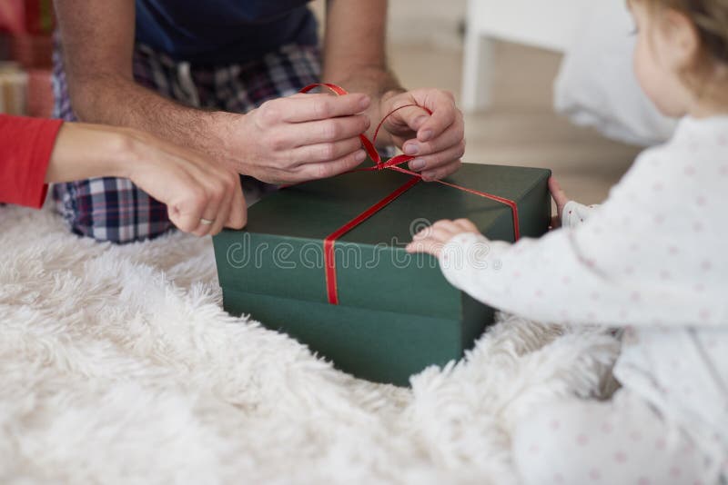 Baby Opening Christmas Present with Parents Stock Image - Image of ...