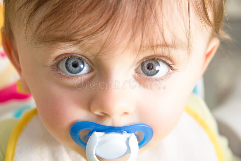 Baby with pacifier stock image. Image of fingers, adorable - 30483387