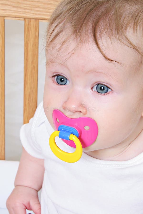 Baby with Pacifier or Dummy Stock Photo - Image of contentment, dummy ...
