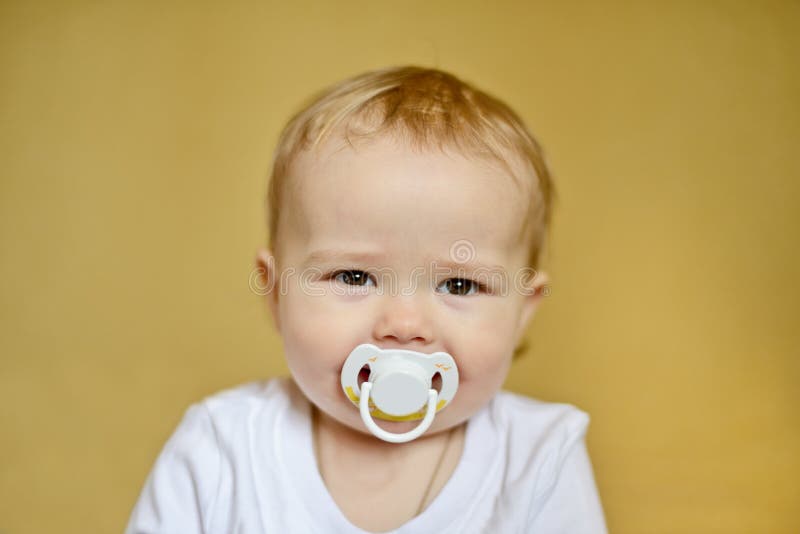 Baby with pacifier stock photo. Image of beauty, generation - 36719530