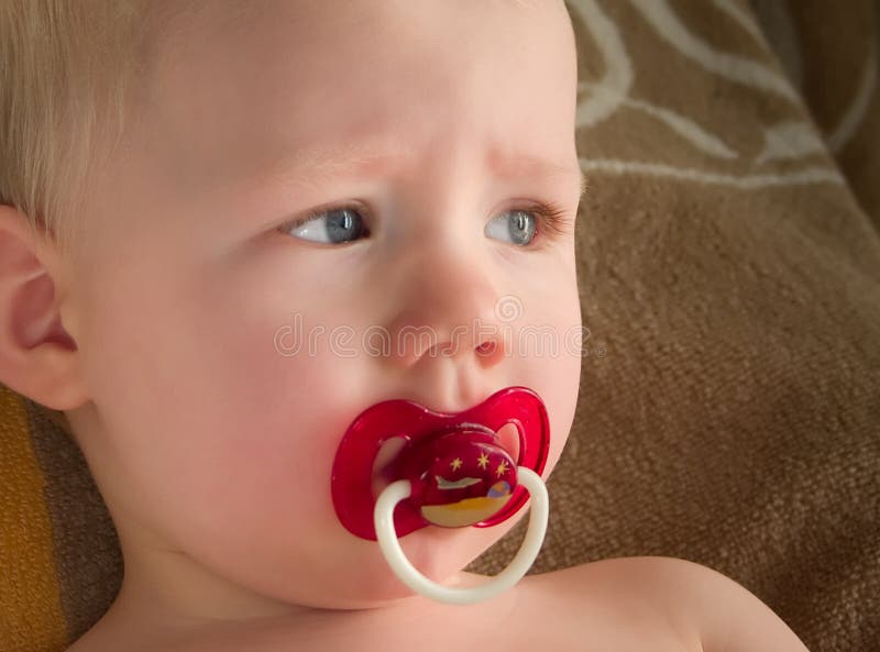 Baby with Pacifier Looking through Stock Image - Image of close, person ...