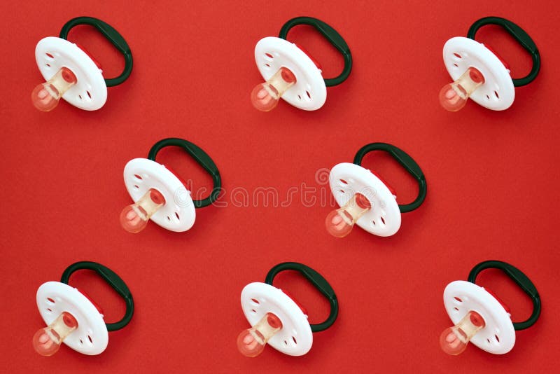 Baby Pacifier on a Red Background, Close-up Stock Image - Image of ...